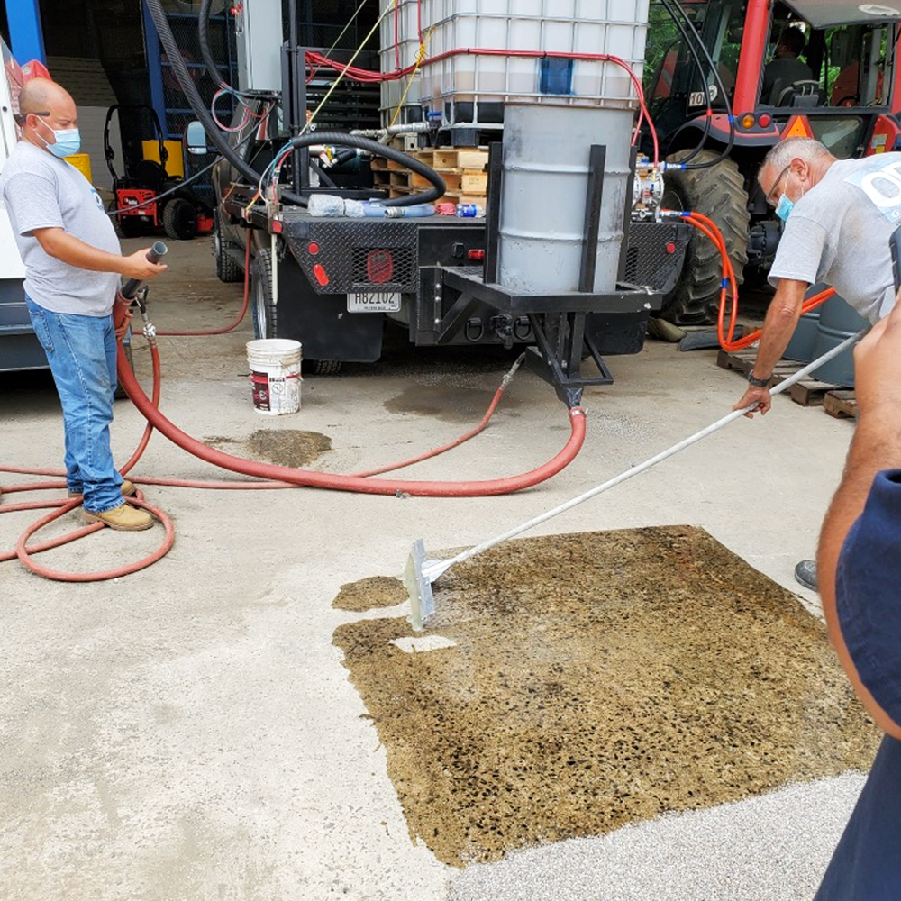 Two Part Epoxy and Urethane Dispensing System for Bridge Deck Overlays